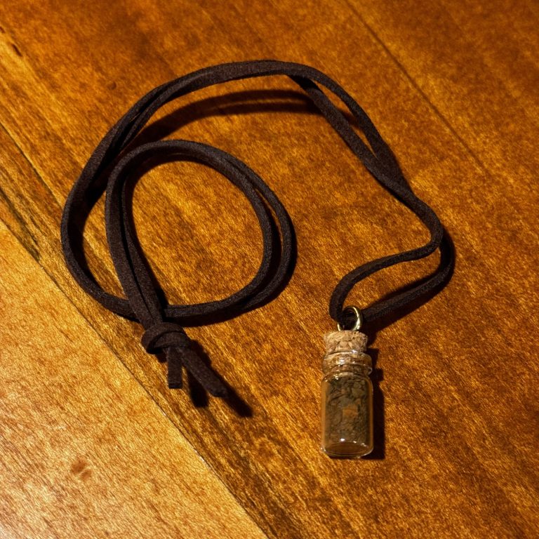 Ned's Pipe Souvenir Rust Necklace - Crystal Lake Tours